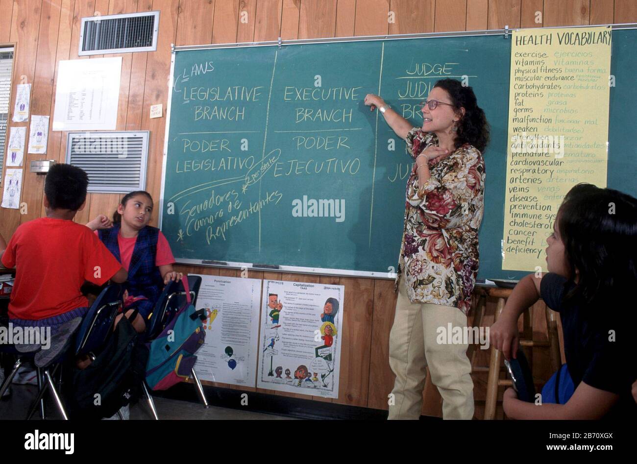 Austin, Texas USA: Female teacher giving civics lesson in English and ...