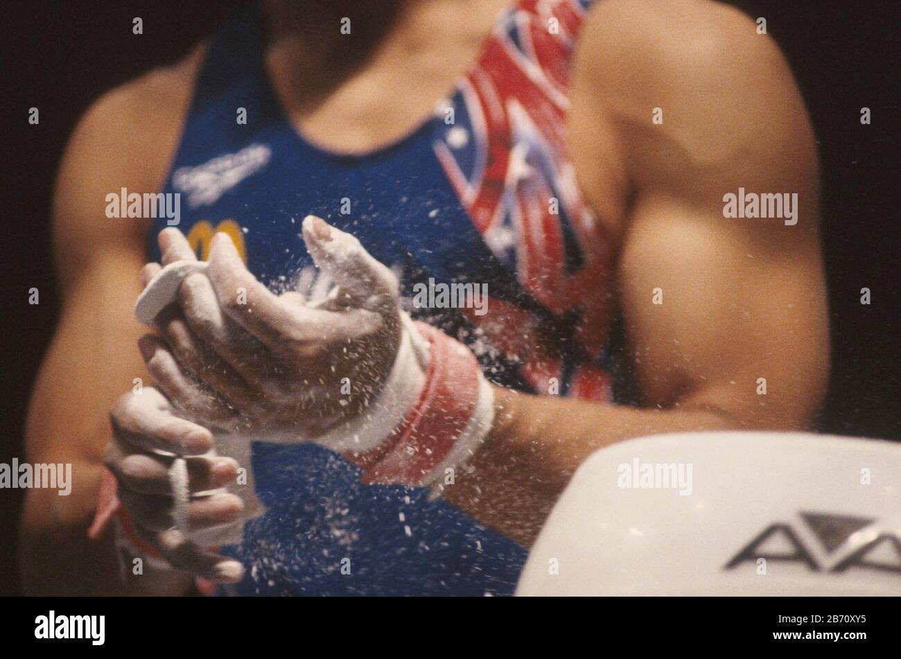 Male gymnast chalking hands hi-res stock photography and images - Alamy