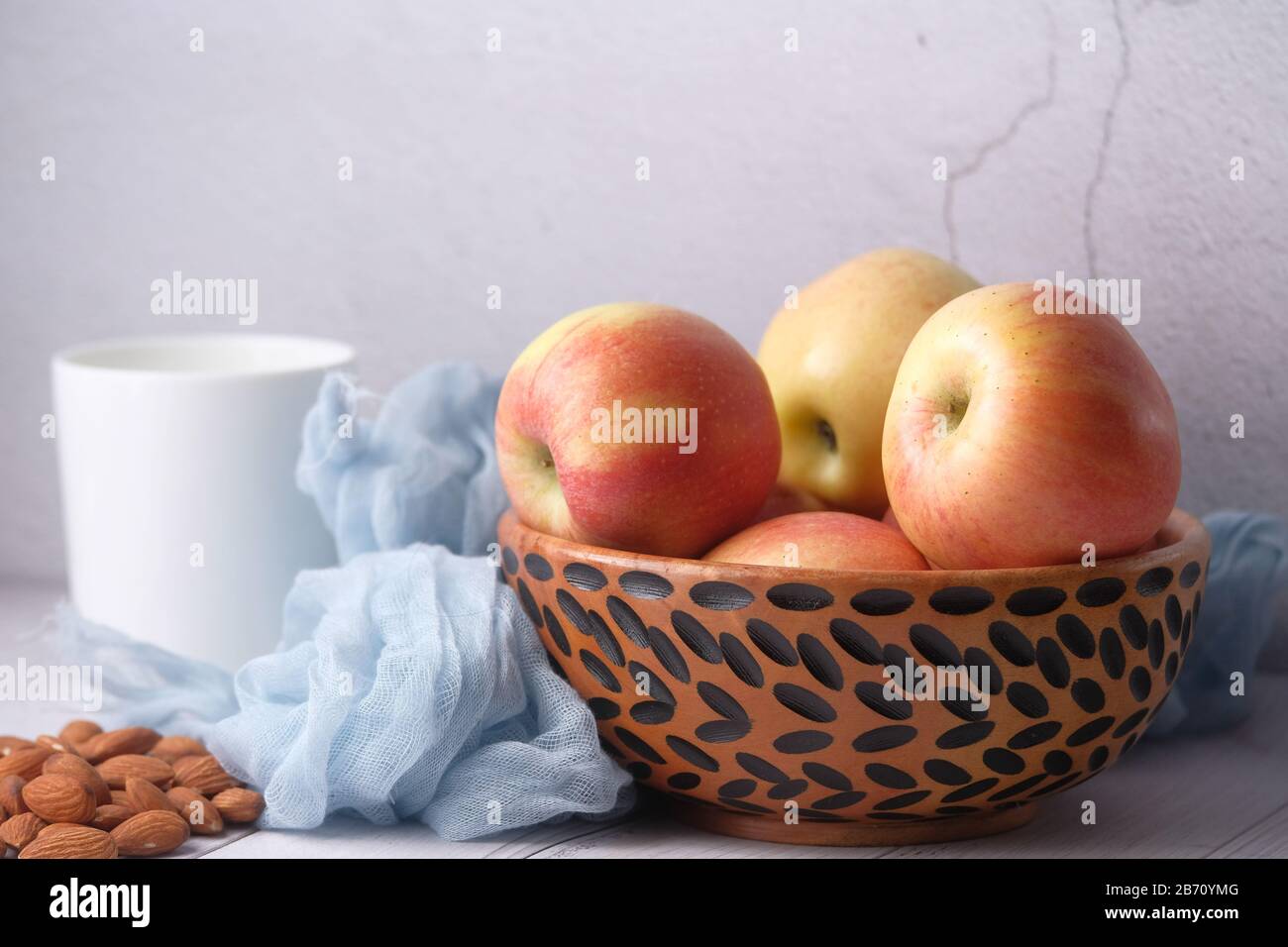 fresh red apple with wooden bowl, close up Stock Photo - Alamy