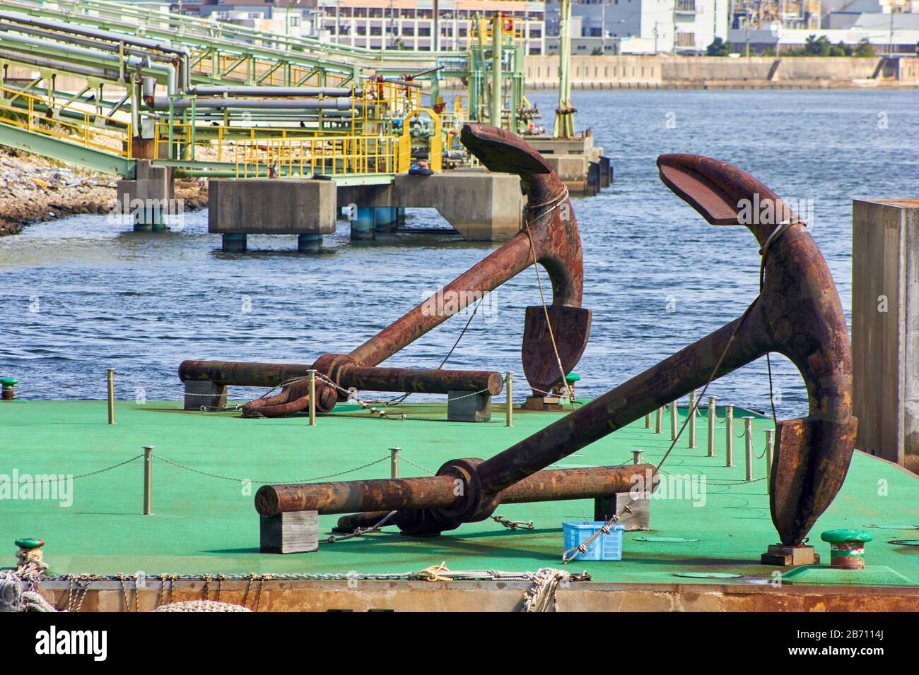 Huge anchors in the bay Stock Photo - Alamy
