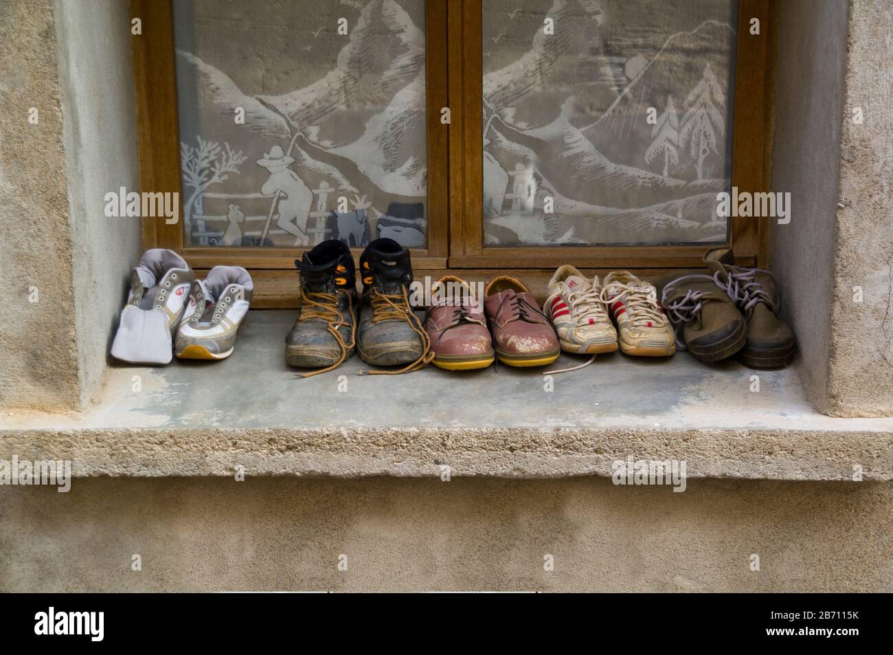 Old Shoes outside Window Stock Photo - Alamy
