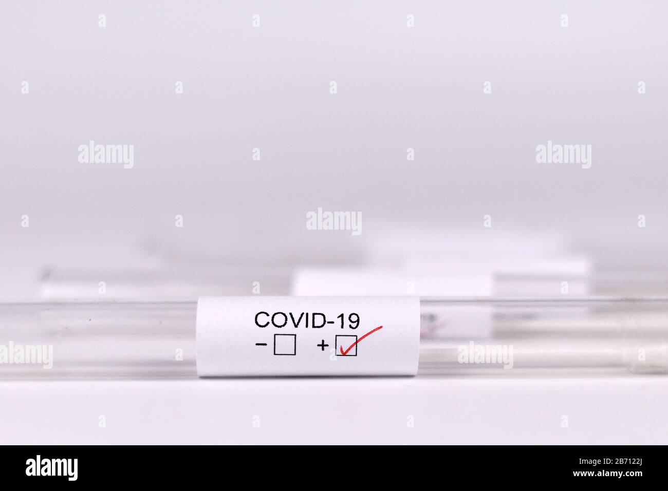 Medical test tube sample for Coronavirus with label Covid-19 with ...