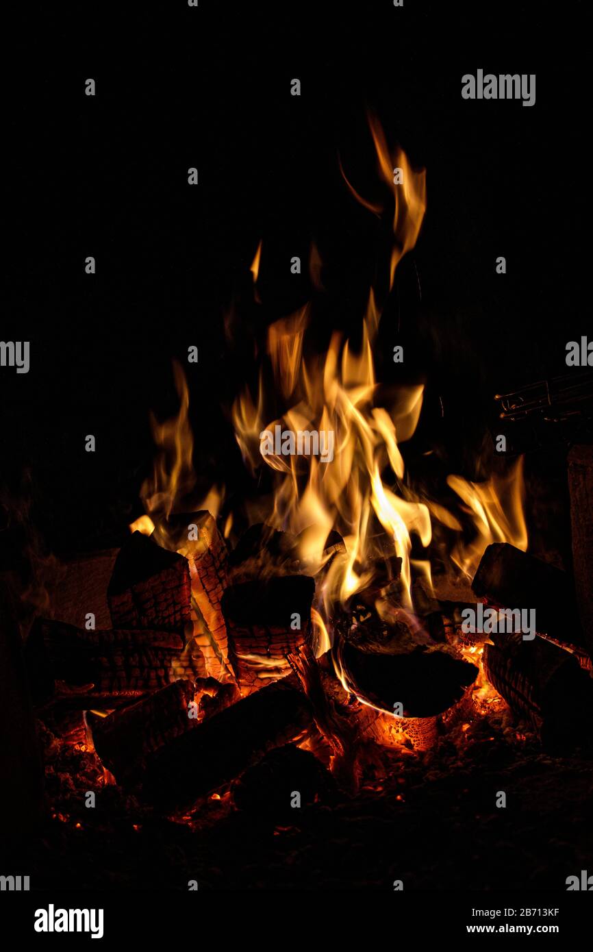 A campfire in the dark Stock Photo - Alamy