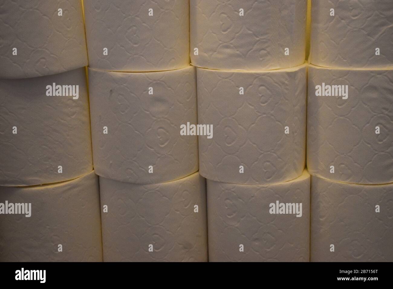 A close up of a pile of stacked toilet paper rolls. Toilet paper panic ...