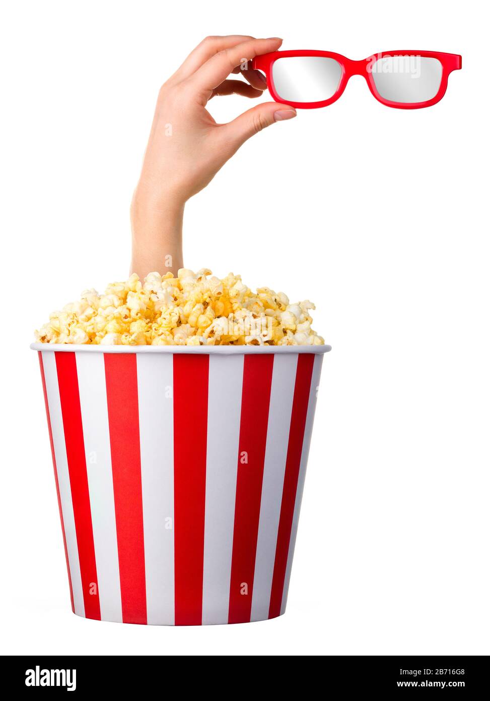 Female hand sticks out of a bucket with popcorn isolated on white ...