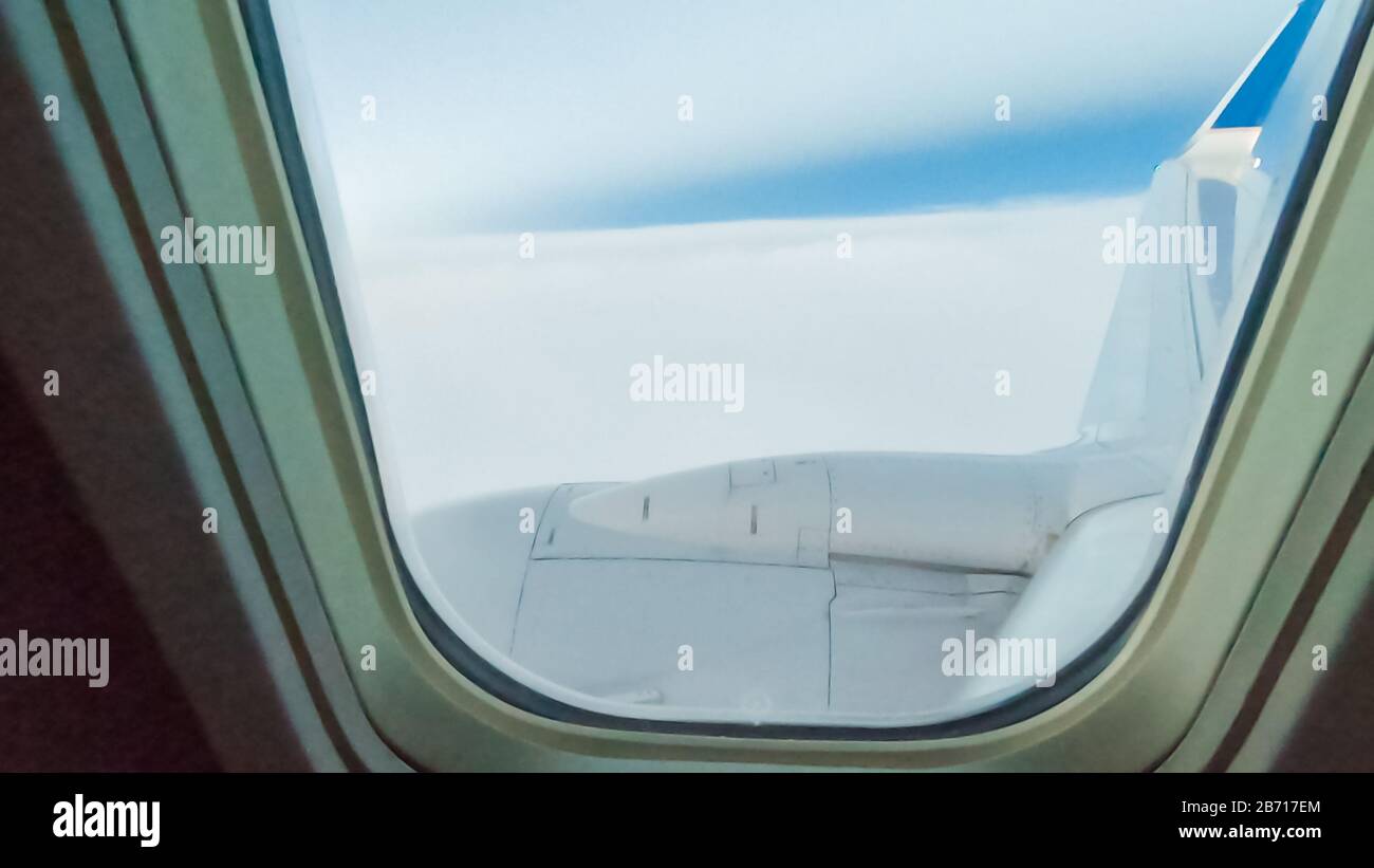 View from the window seat of commercial passenger airplane Stock Photo ...
