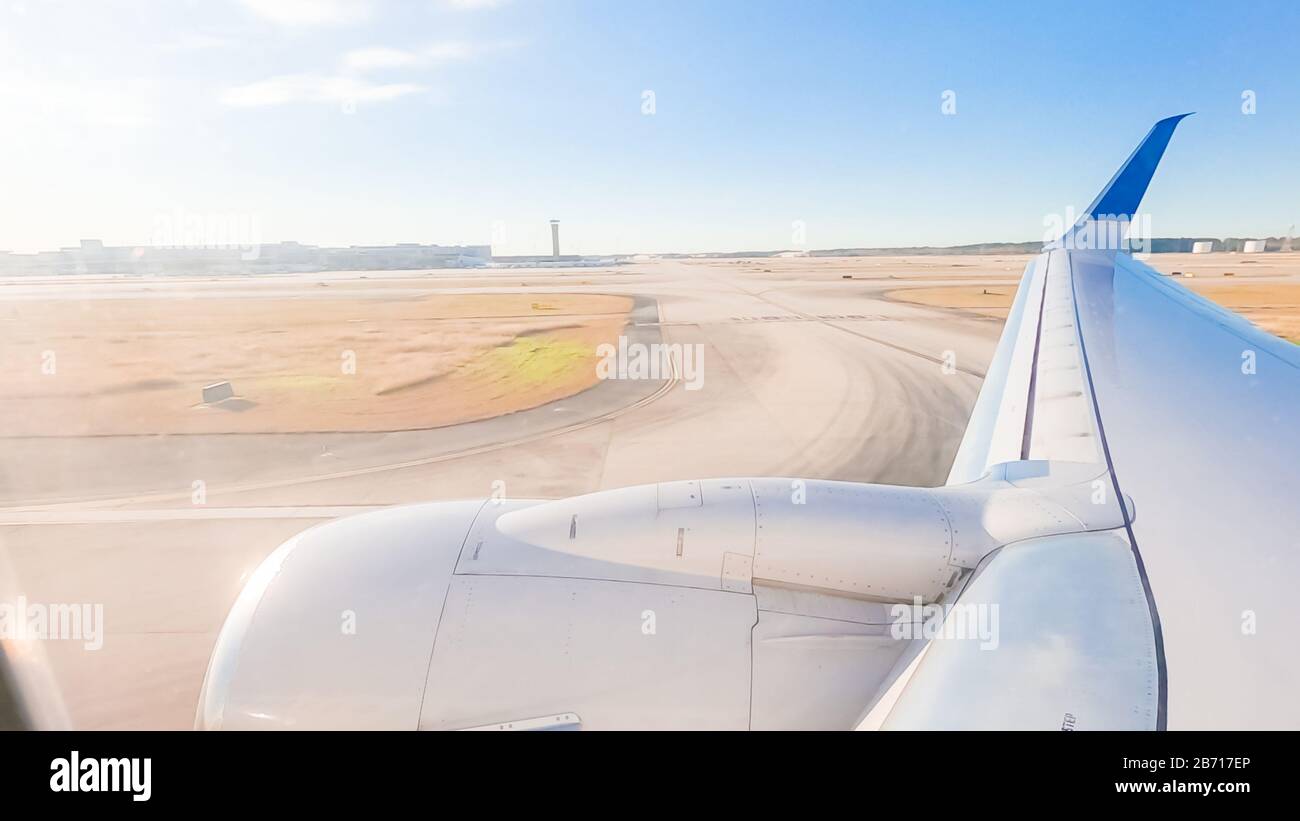 View from the window seat of commercial passenger airplane Stock Photo ...