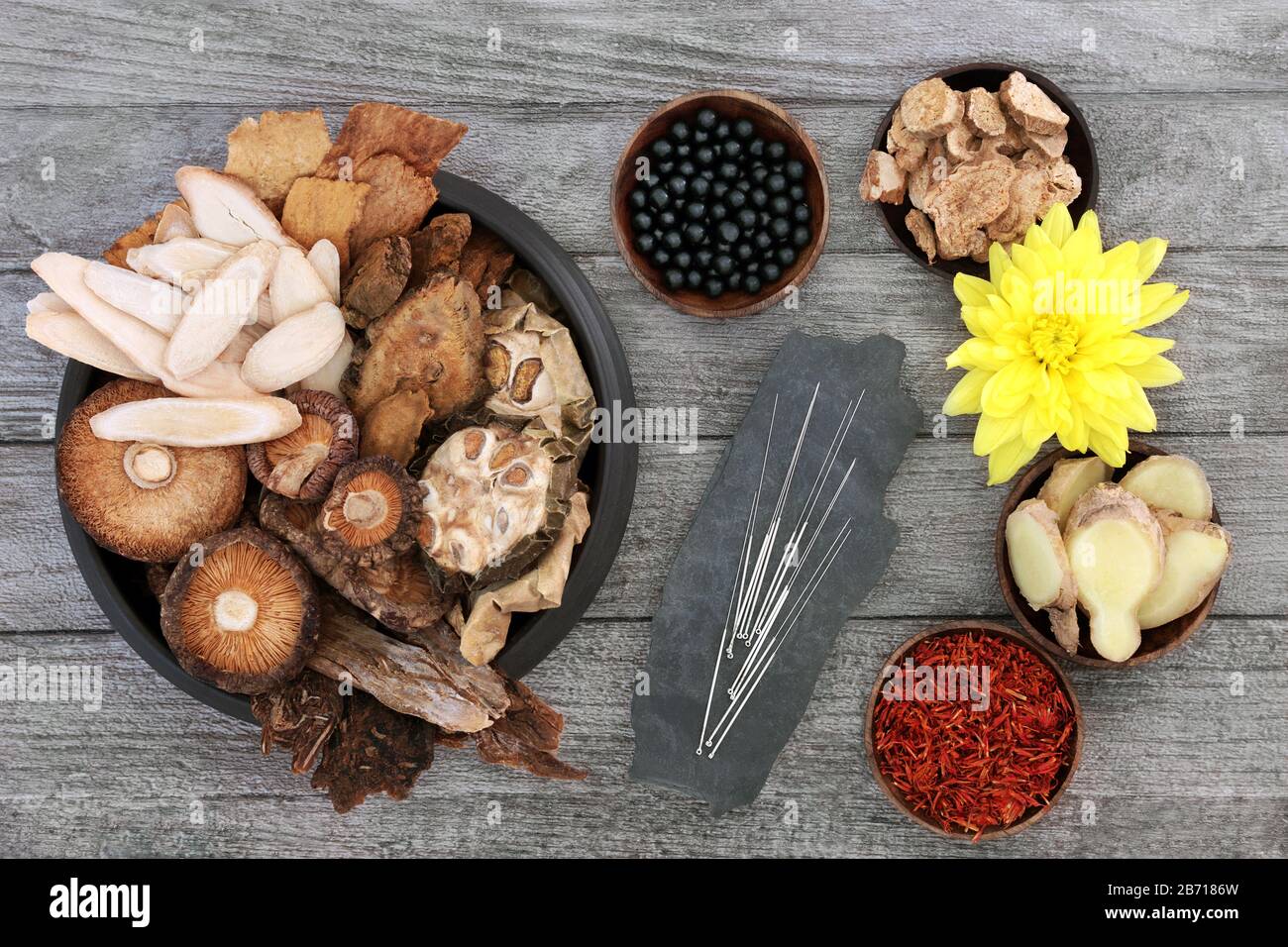 Traditional Chinese herbs, acupuncture needles and tablets to boost chi ...