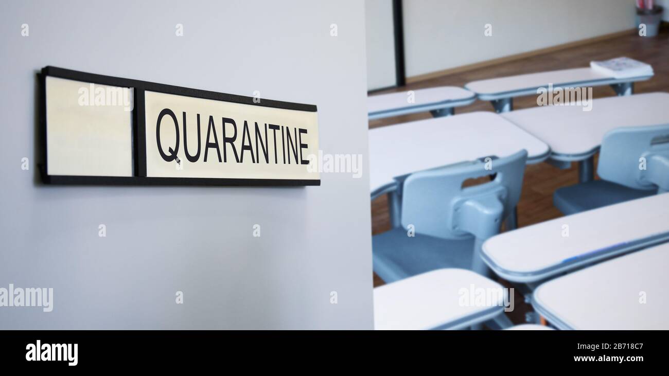 signboard with information of quarantine on door on background of ...