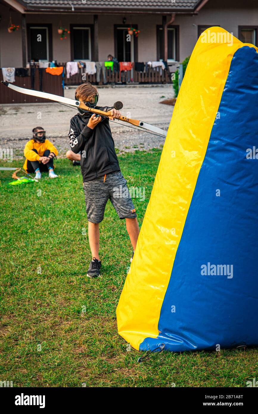 Boy archery bow arrow hi-res stock photography and images - Alamy