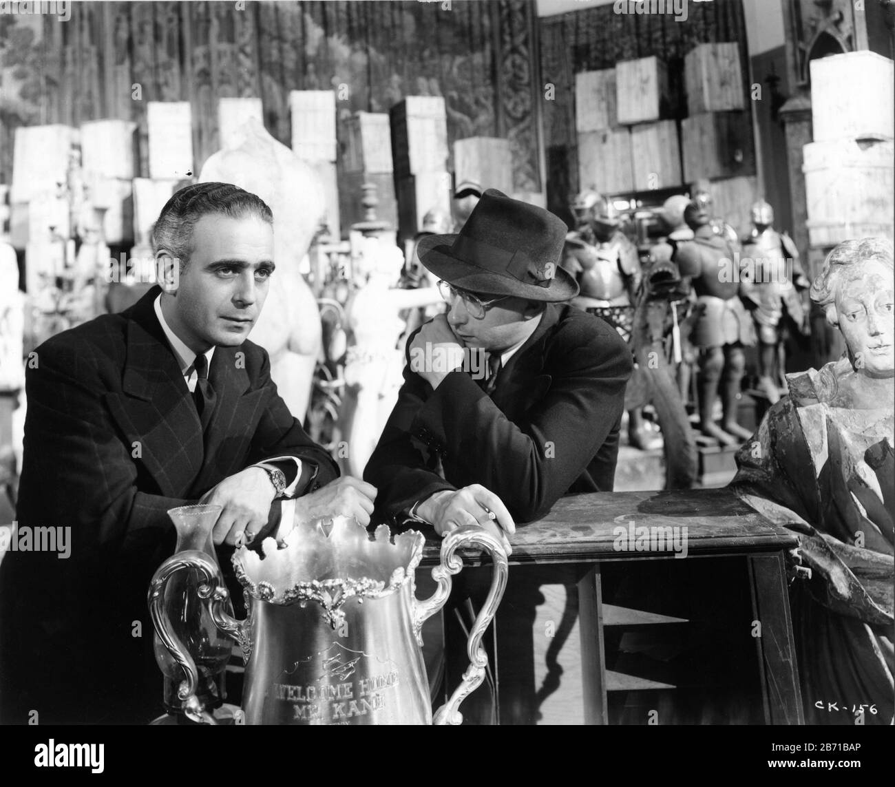 PAUL STEWART as Raymond and WILLIAM ALLAND as newspaper reporter Jerry ...