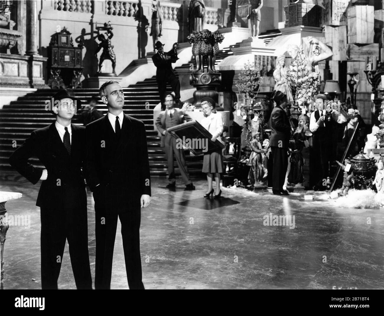 WILLIAM ALLAND as newspaper reporter Jerry Thompson and PAUL STEWART as ...