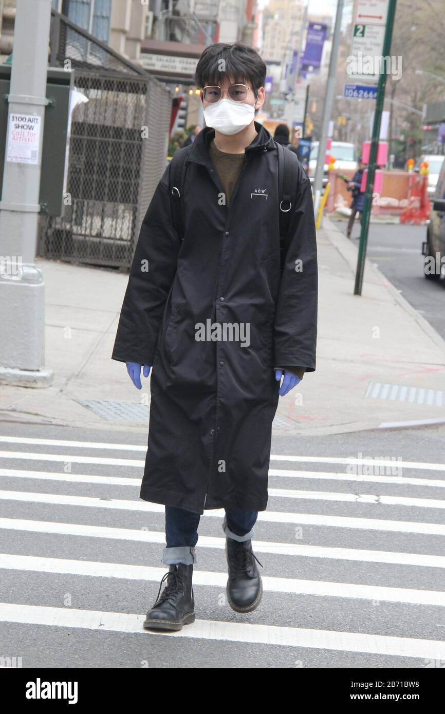 New York, NY, USA. 12th Mar, 2020. Pedestrian seen walking wearing a ...