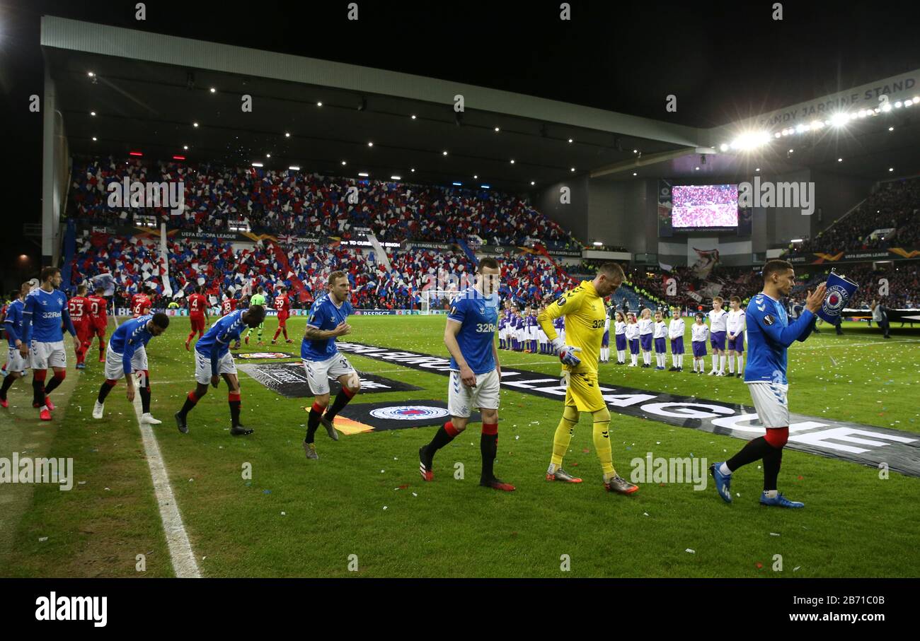 Rangers players walk out to a full stand during the UEFA Europa League ...