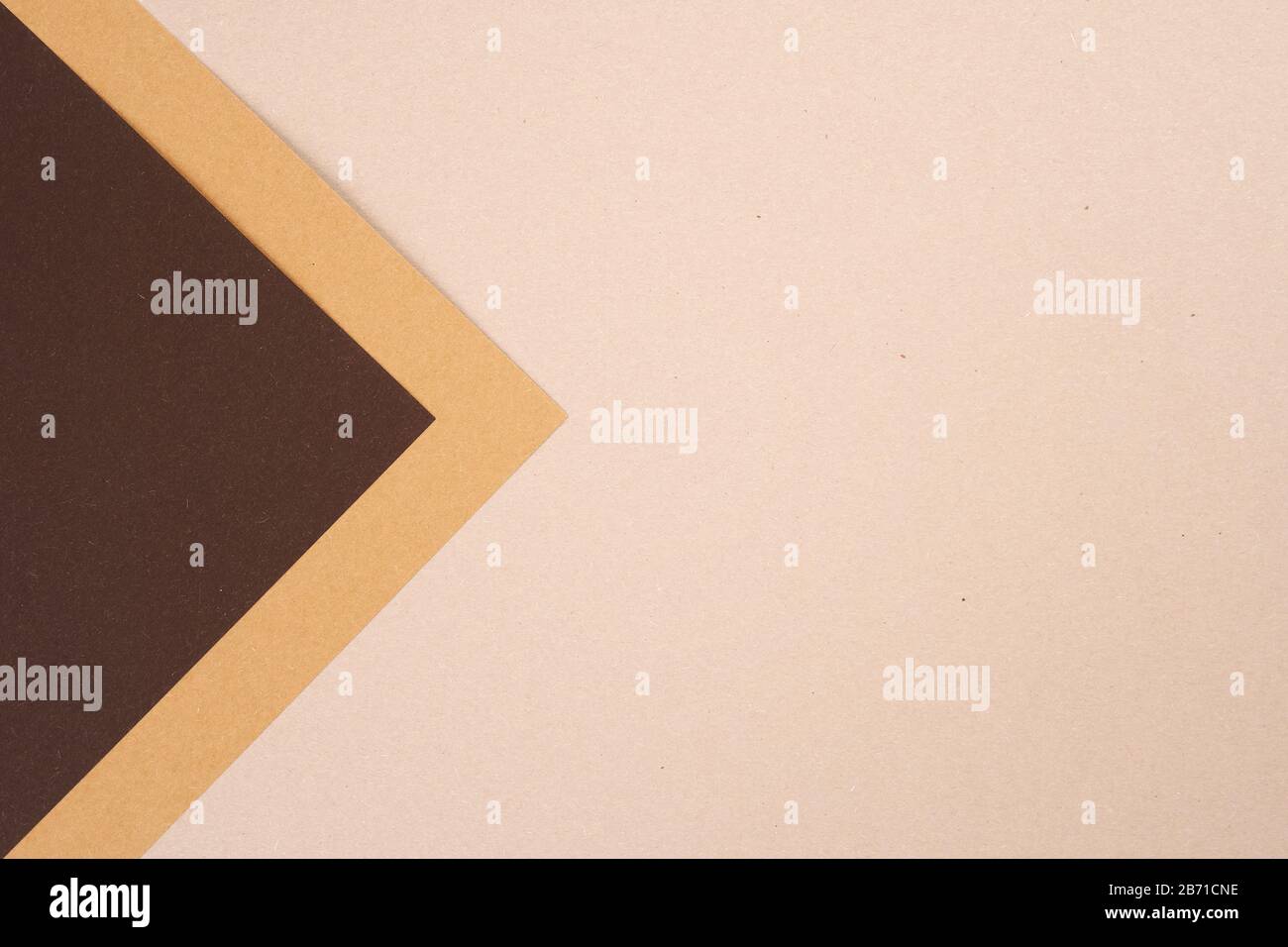 Background from recycled textured paper forming abstract triangular ...