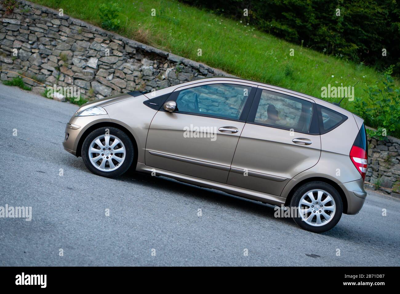 German sedan car, Mercedes Benz A class, type W203 isolated in an empty ...