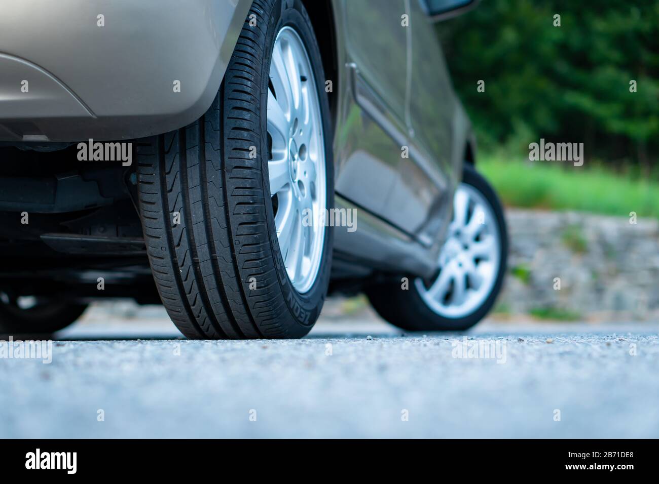 Alloy wheels with tires mounted on. Close-up photo of profile model ...
