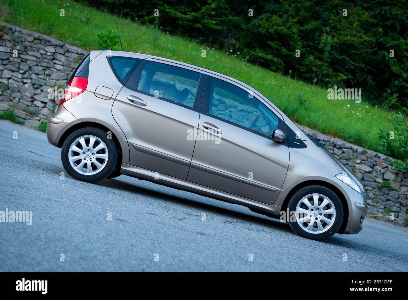 German sedan car, Mercedes Benz A class, type W203 isolated in an empty ...