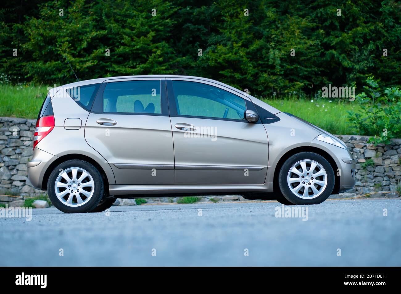 German sedan car, Mercedes Benz A class, type W203 isolated in an empty ...