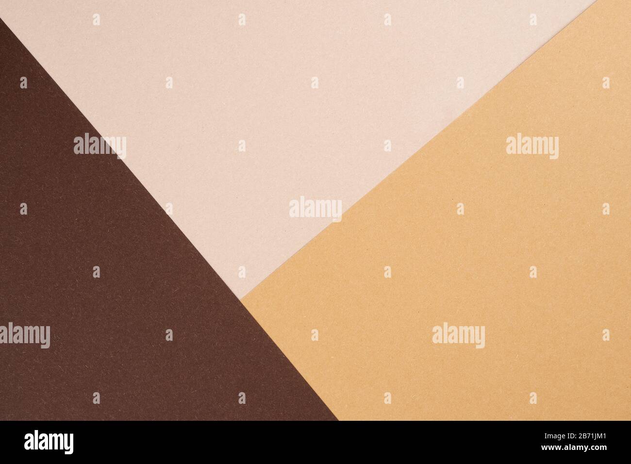 Background from recycled textured paper forming triangular shades of ...