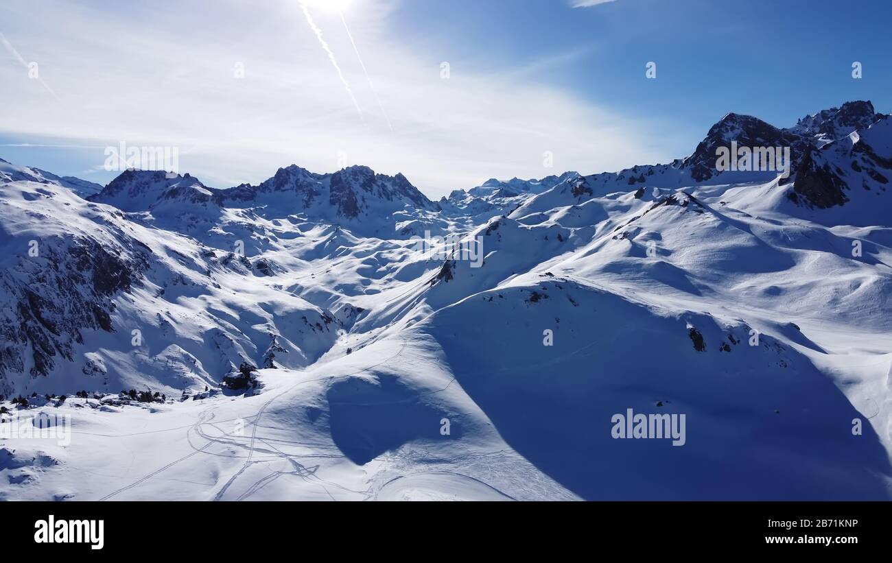 Aerial view of the Alps mountains in France. Mountain tops covered in ...