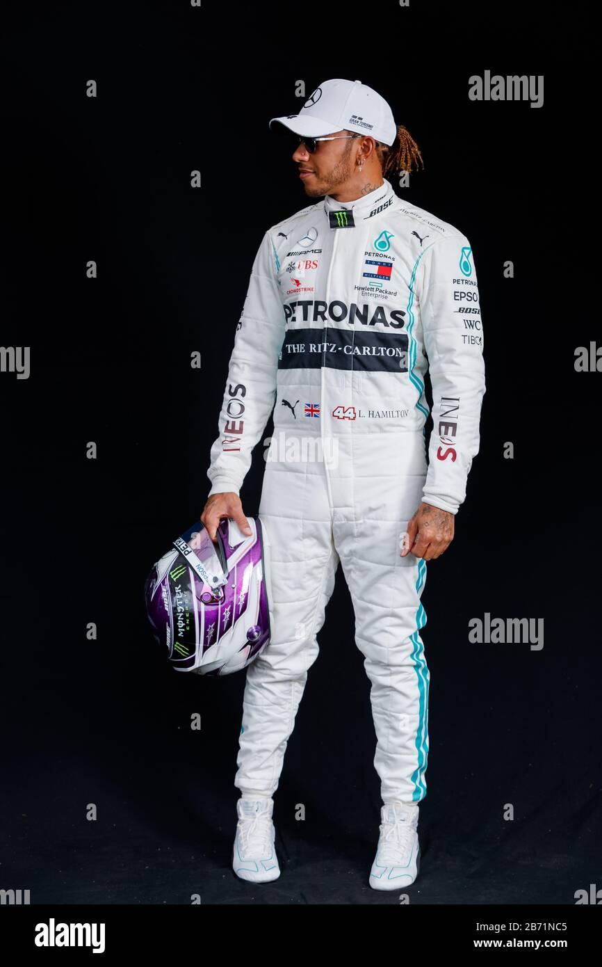 Lewis hamilton black race suit hi-res stock photography and images - Alamy