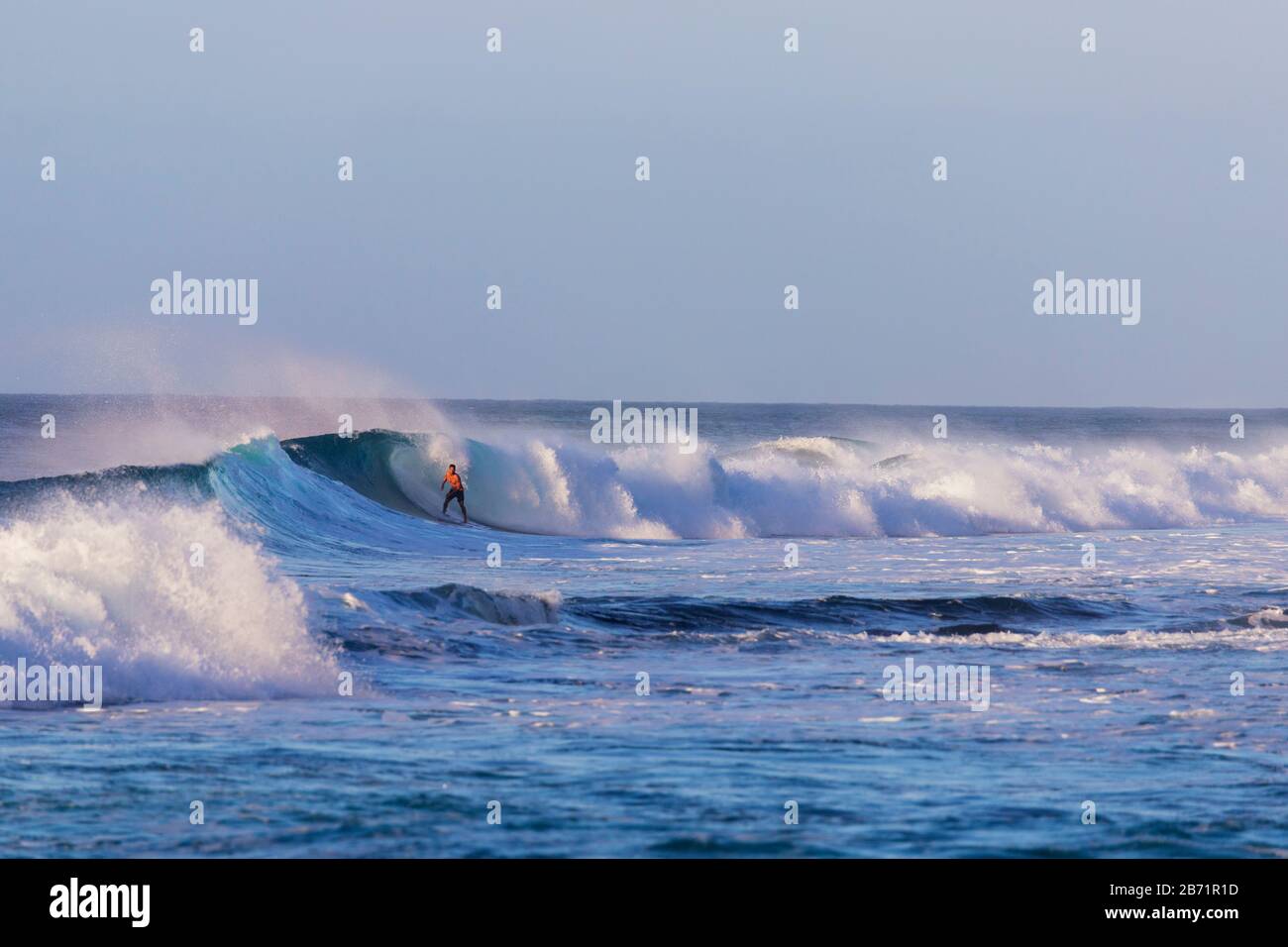 Oahu man surfing waimea bay hi-res stock photography and images - Alamy