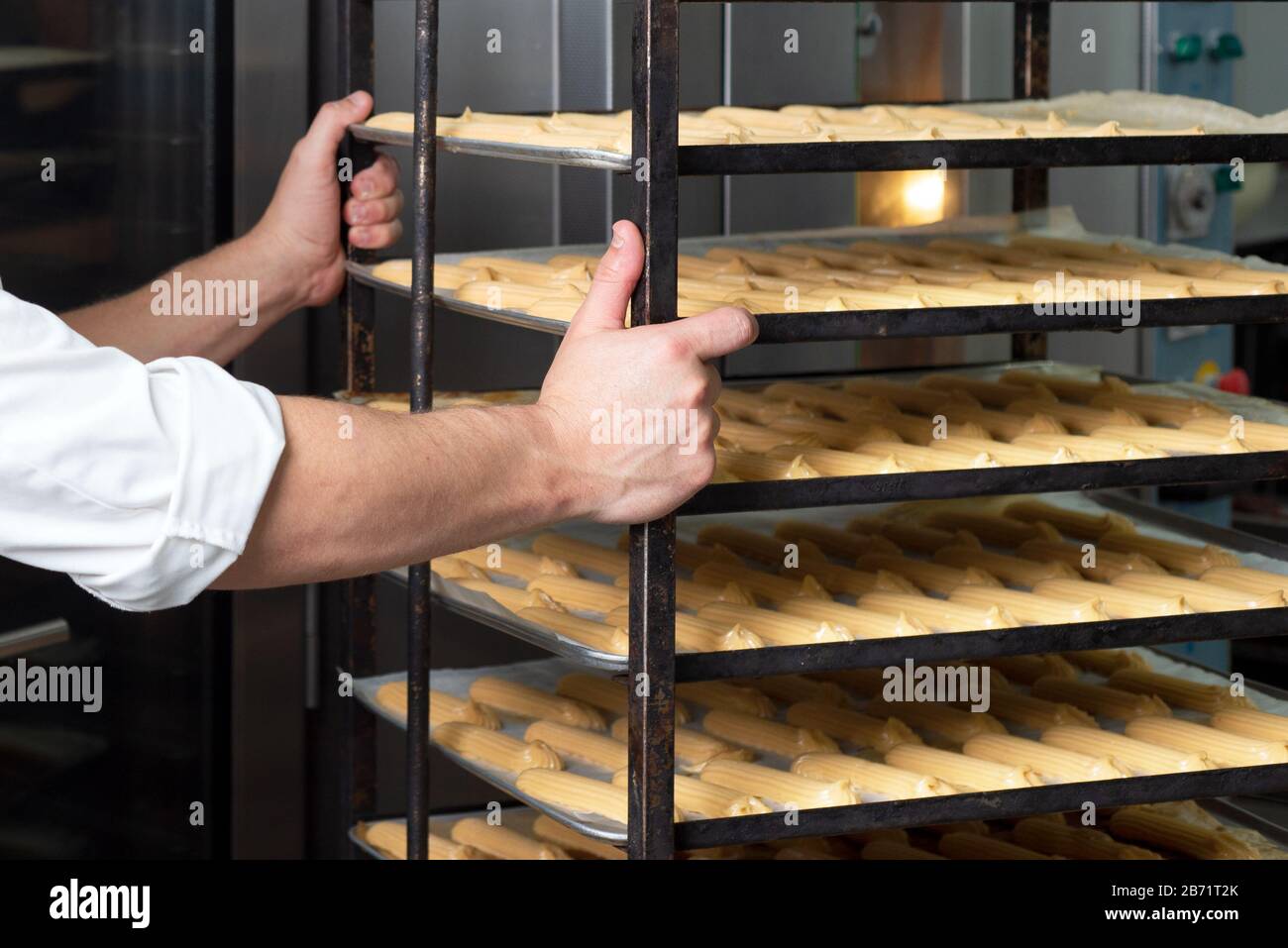 Man pushing rack hi-res stock photography and images - Alamy