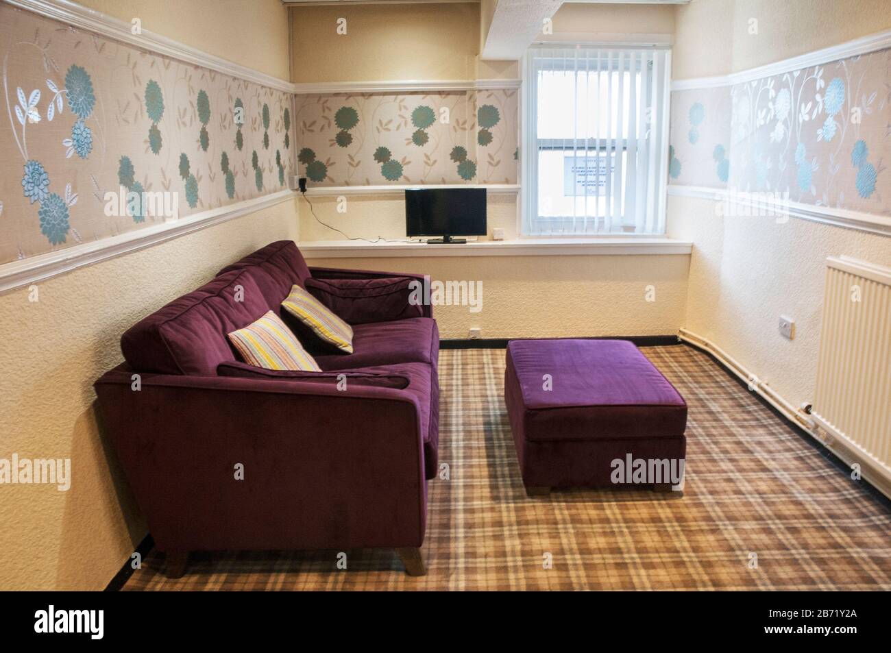 Stars No2 dressing room relaxing area with settee couch, pouffe and ...