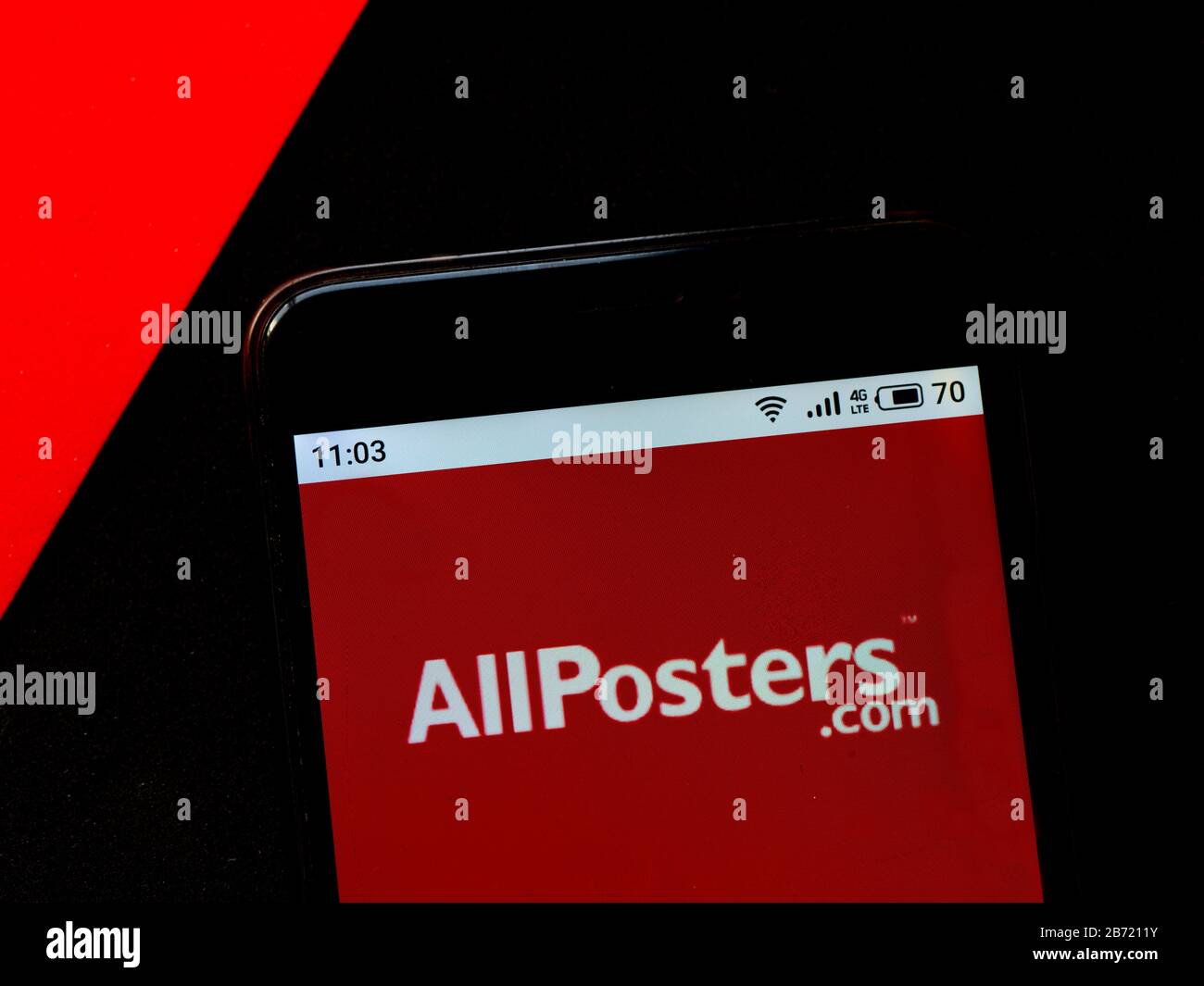 In this photo illustration the AllPosters logo is seen displayed on a ...