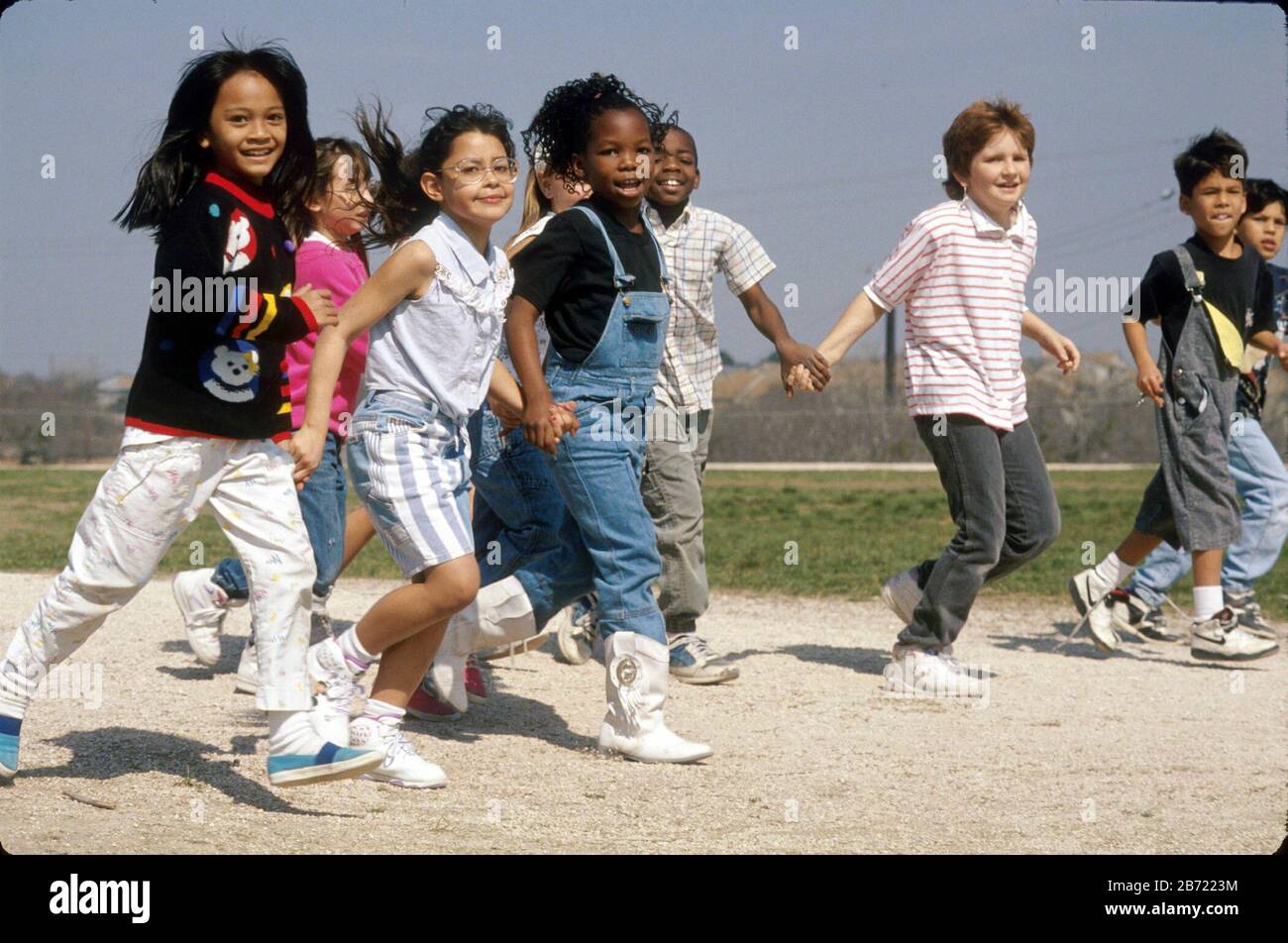 Austin Texas USA: Multi-racial group of children on playground at ...
