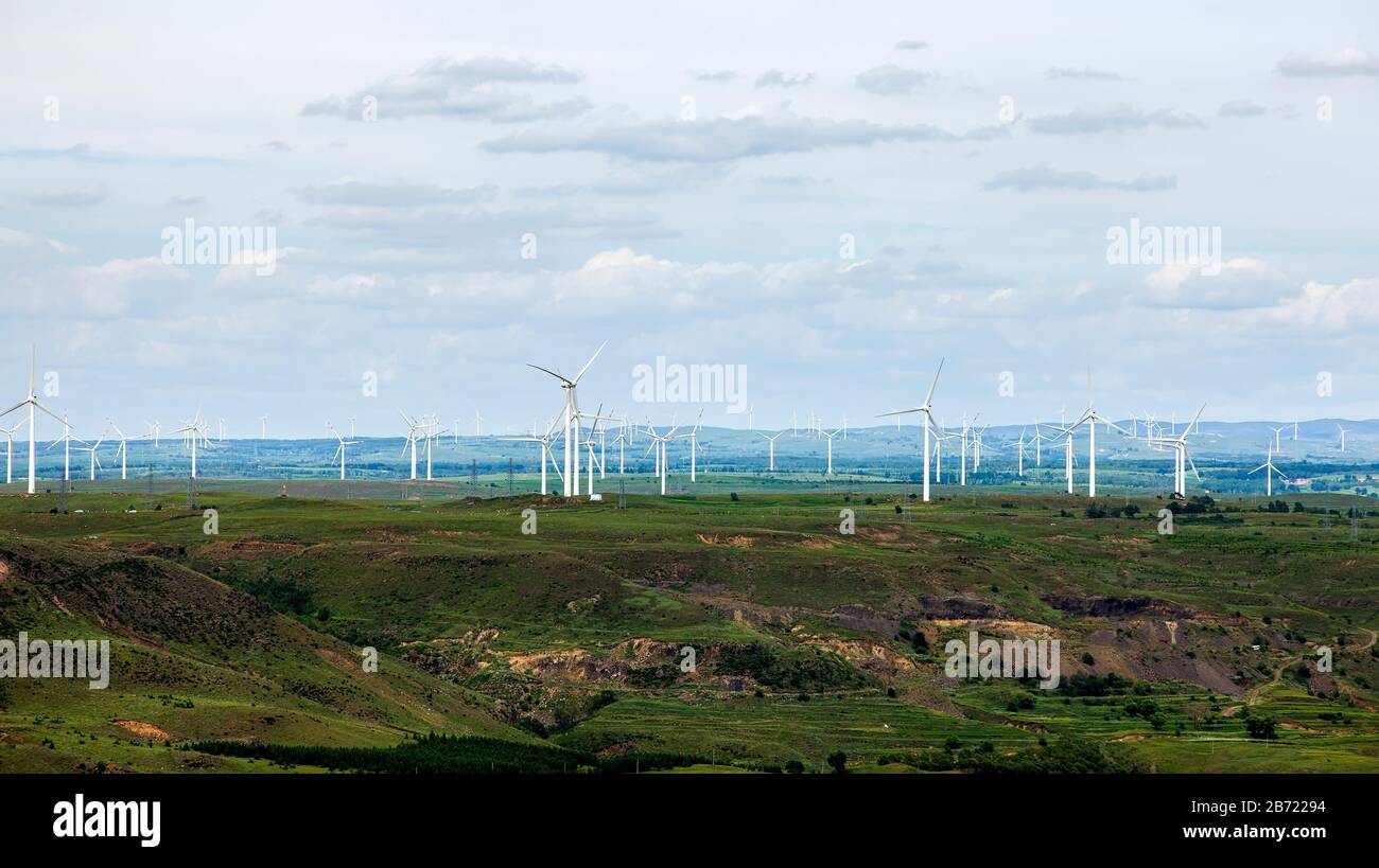 Wind turbines in the grasslands Stock Photo - Alamy