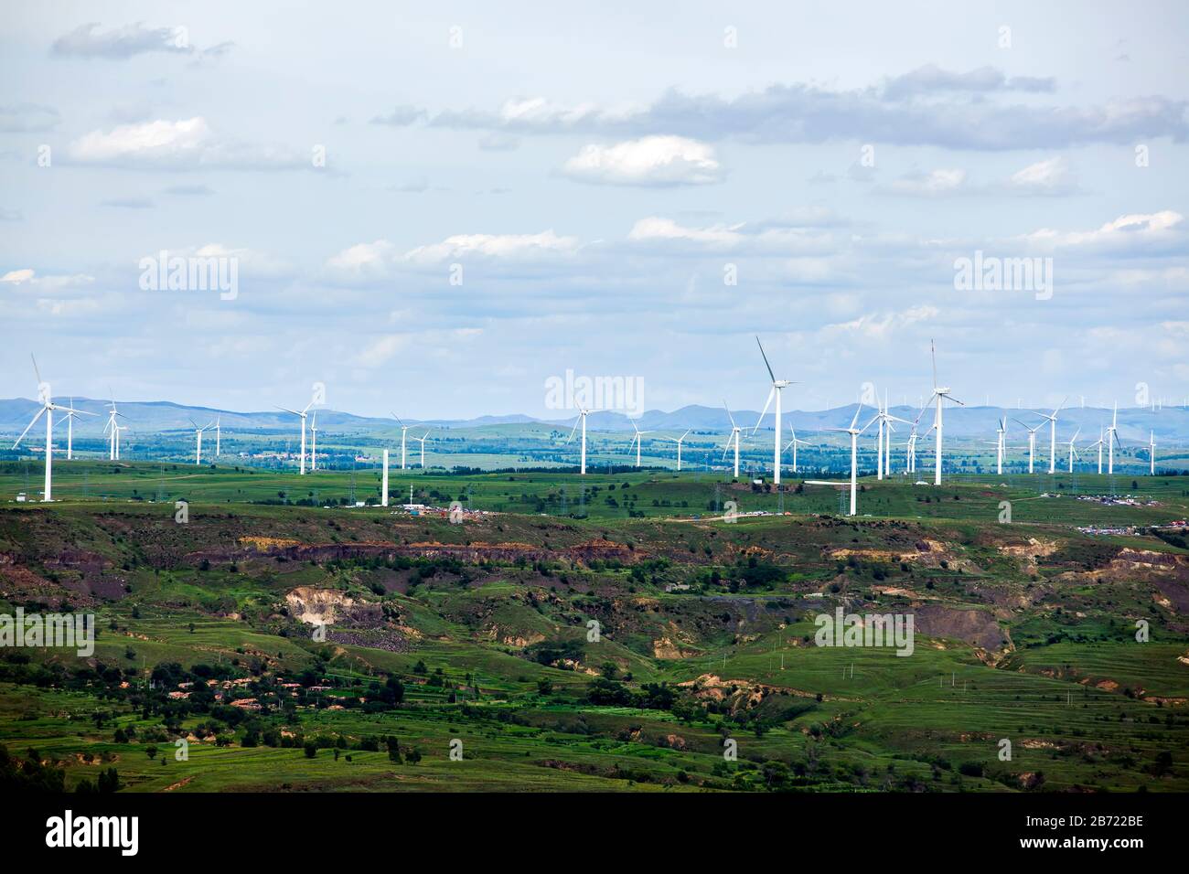 Wind turbines in the grasslands Stock Photo - Alamy