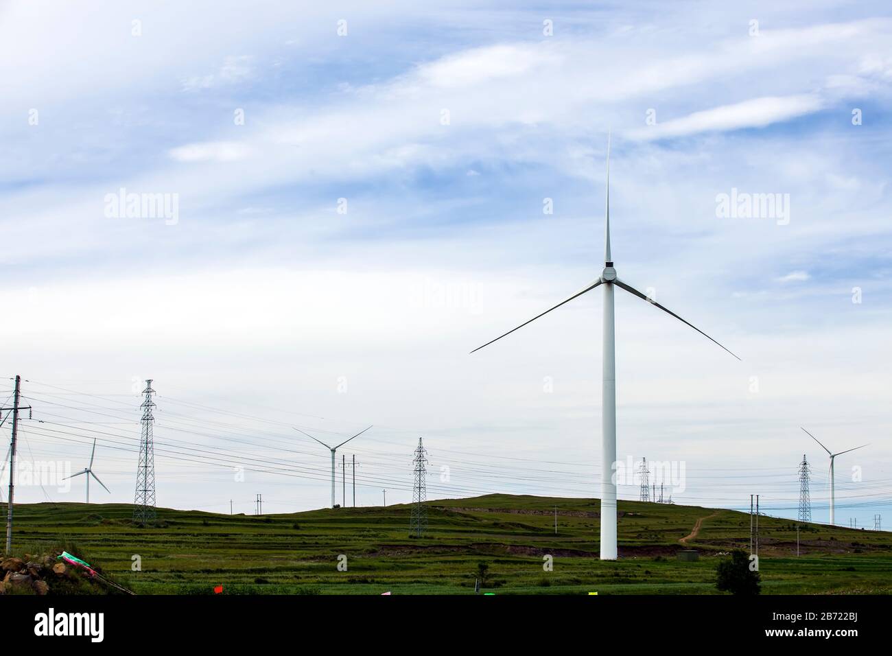 Wind turbines in the grasslands Stock Photo - Alamy