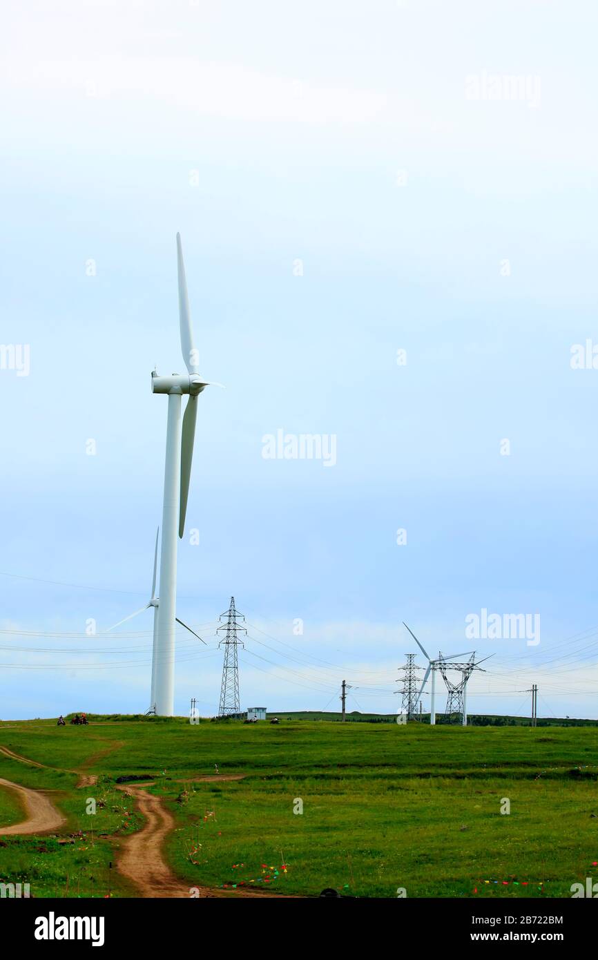 Wind turbines in the grasslands Stock Photo - Alamy