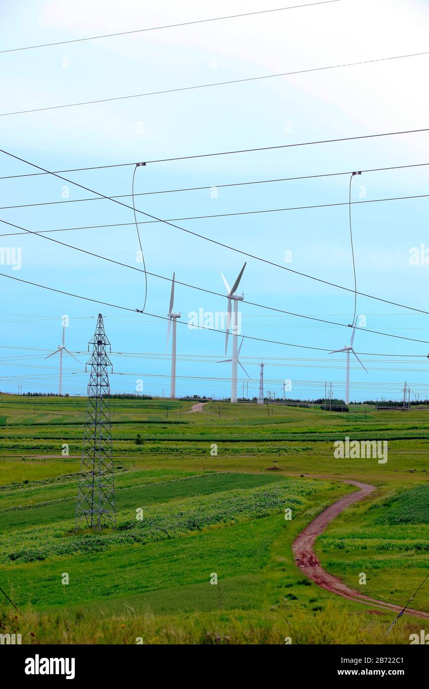Wind turbines in the grasslands Stock Photo - Alamy