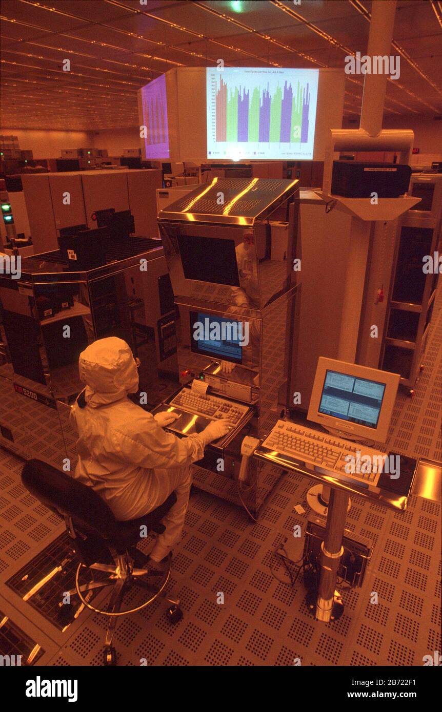 Austin, Texas USA: Employee wearing clean suit working at Advanced ...