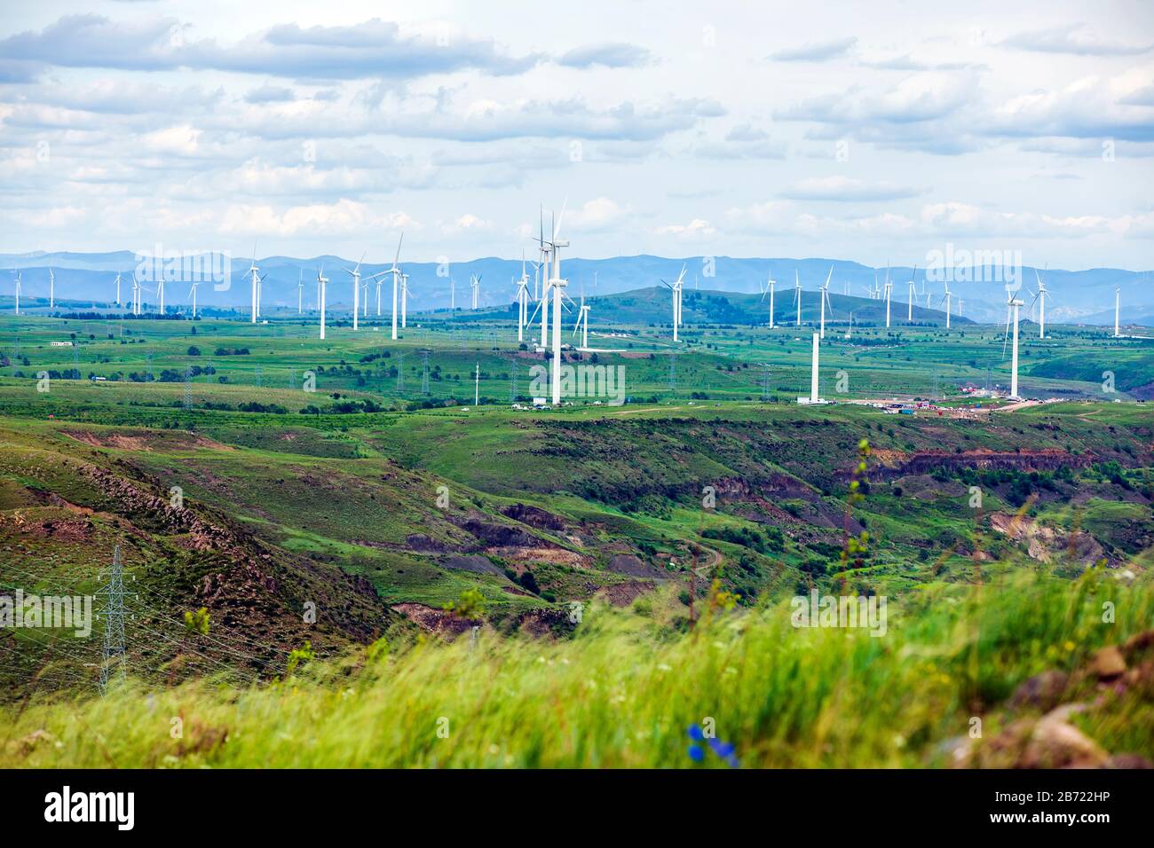 Wind turbines in the grasslands Stock Photo - Alamy