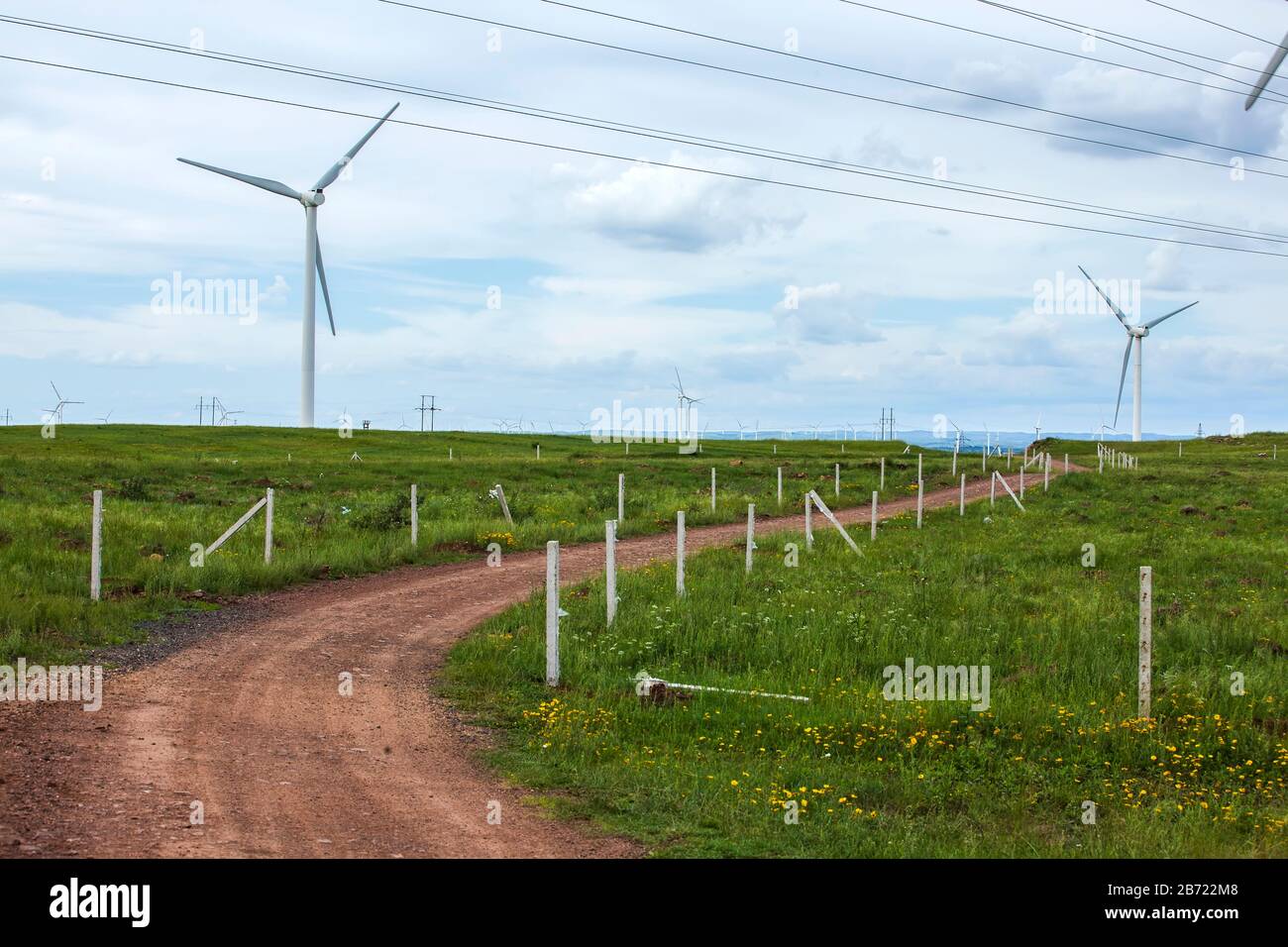 Wind turbines in the grasslands Stock Photo - Alamy