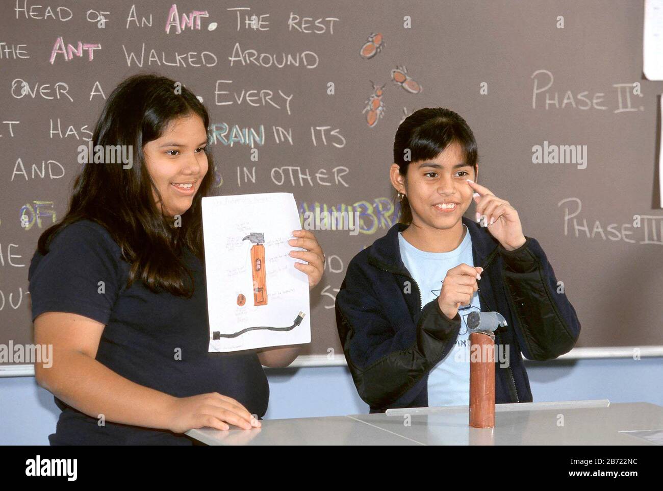 Austin, Texas USA: Hispanic girls make presentation in junior high ...