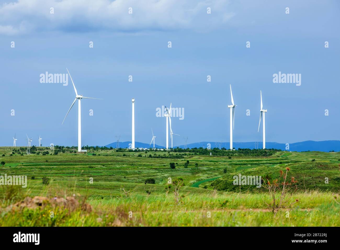 Wind turbines in the grasslands Stock Photo - Alamy