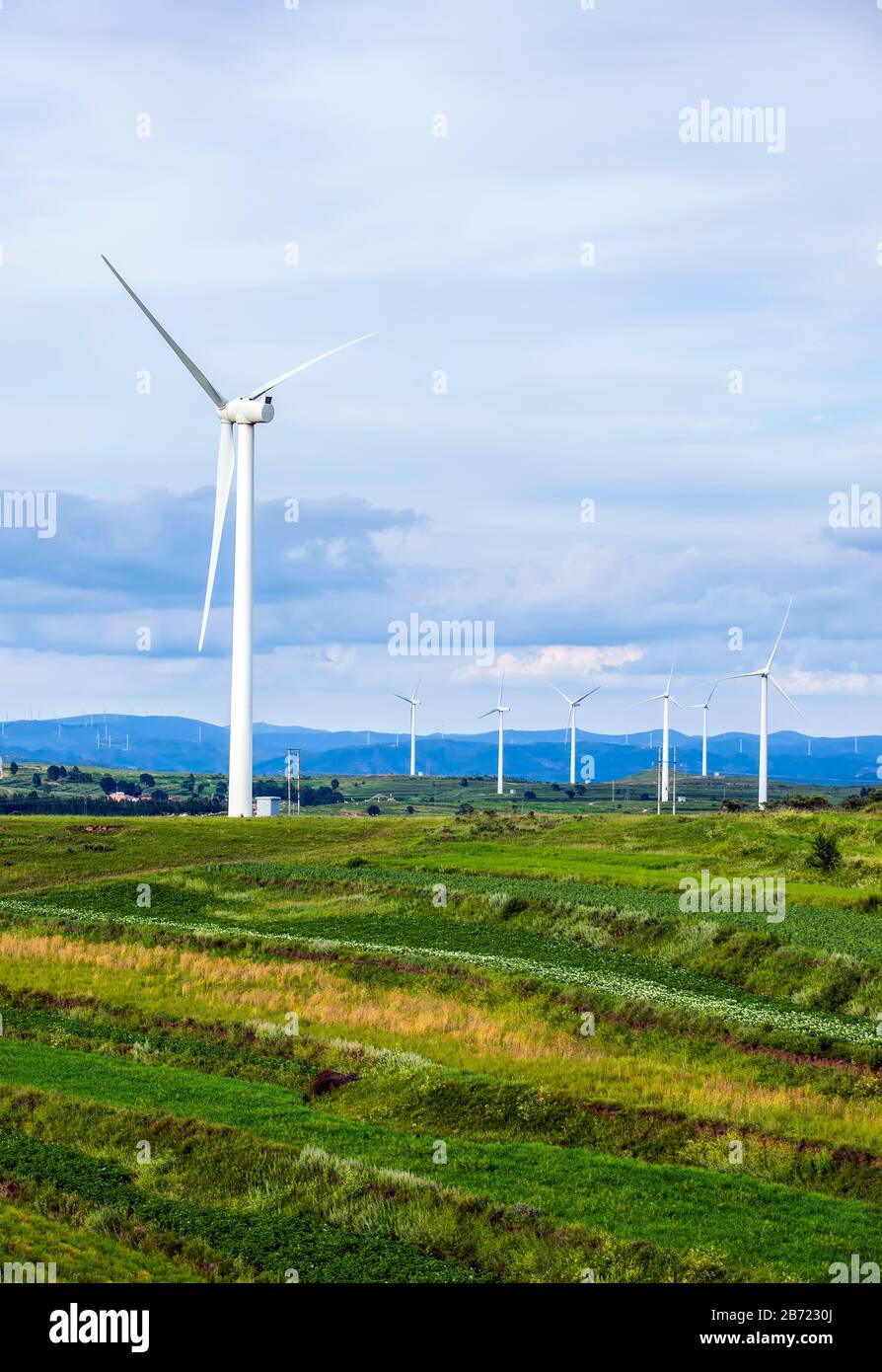 Wind turbines in the grasslands Stock Photo - Alamy