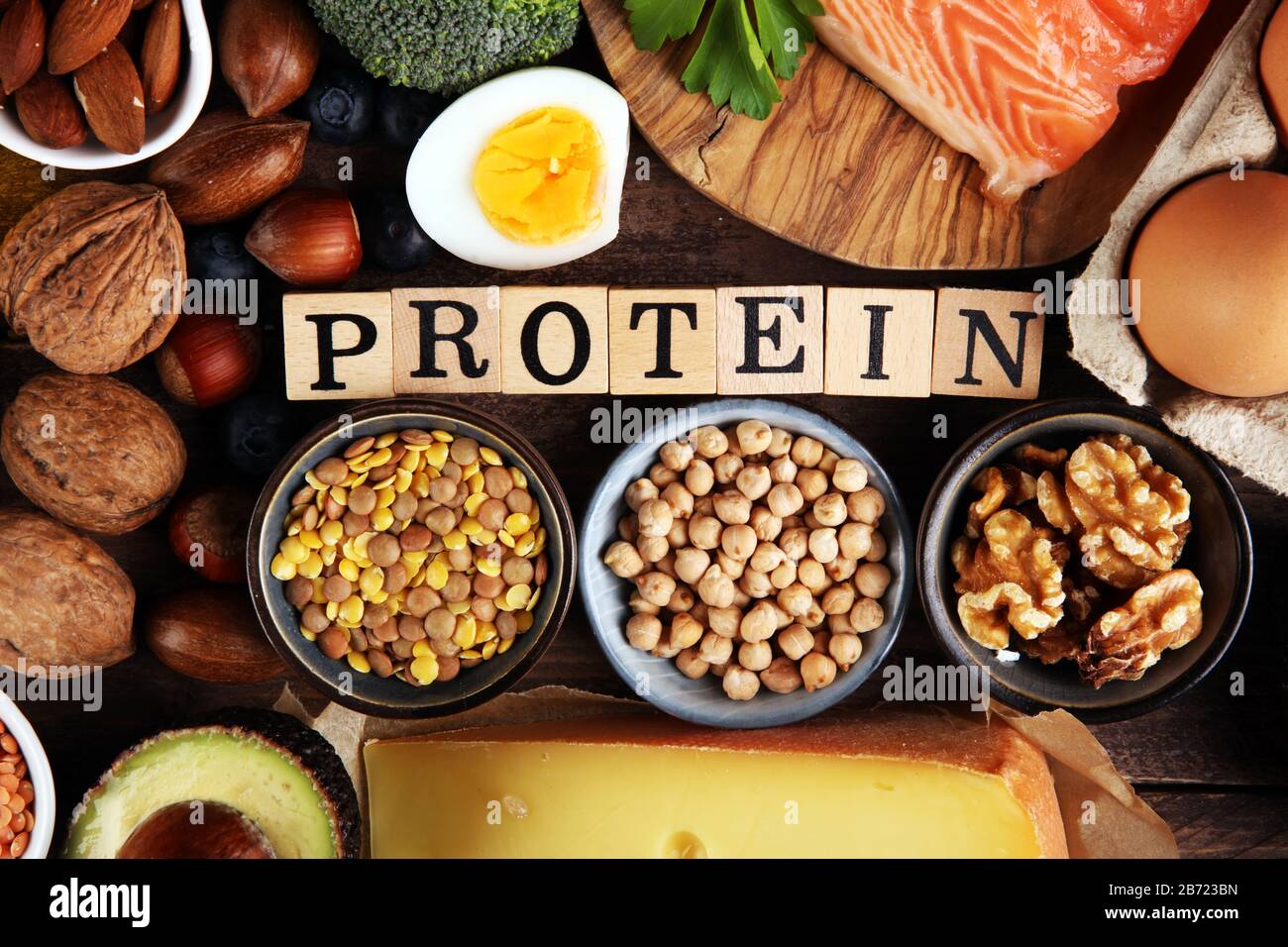 healthy eating and diet concept - natural rich in protein food on table ...