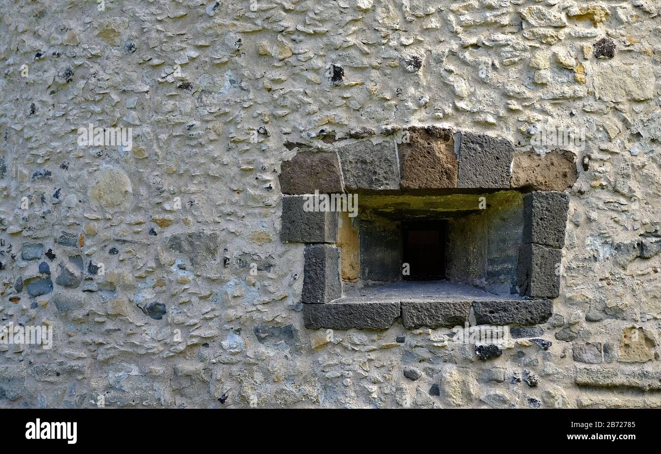 Window in a Medieval fortress or castle, stone wall, offset view Stock ...