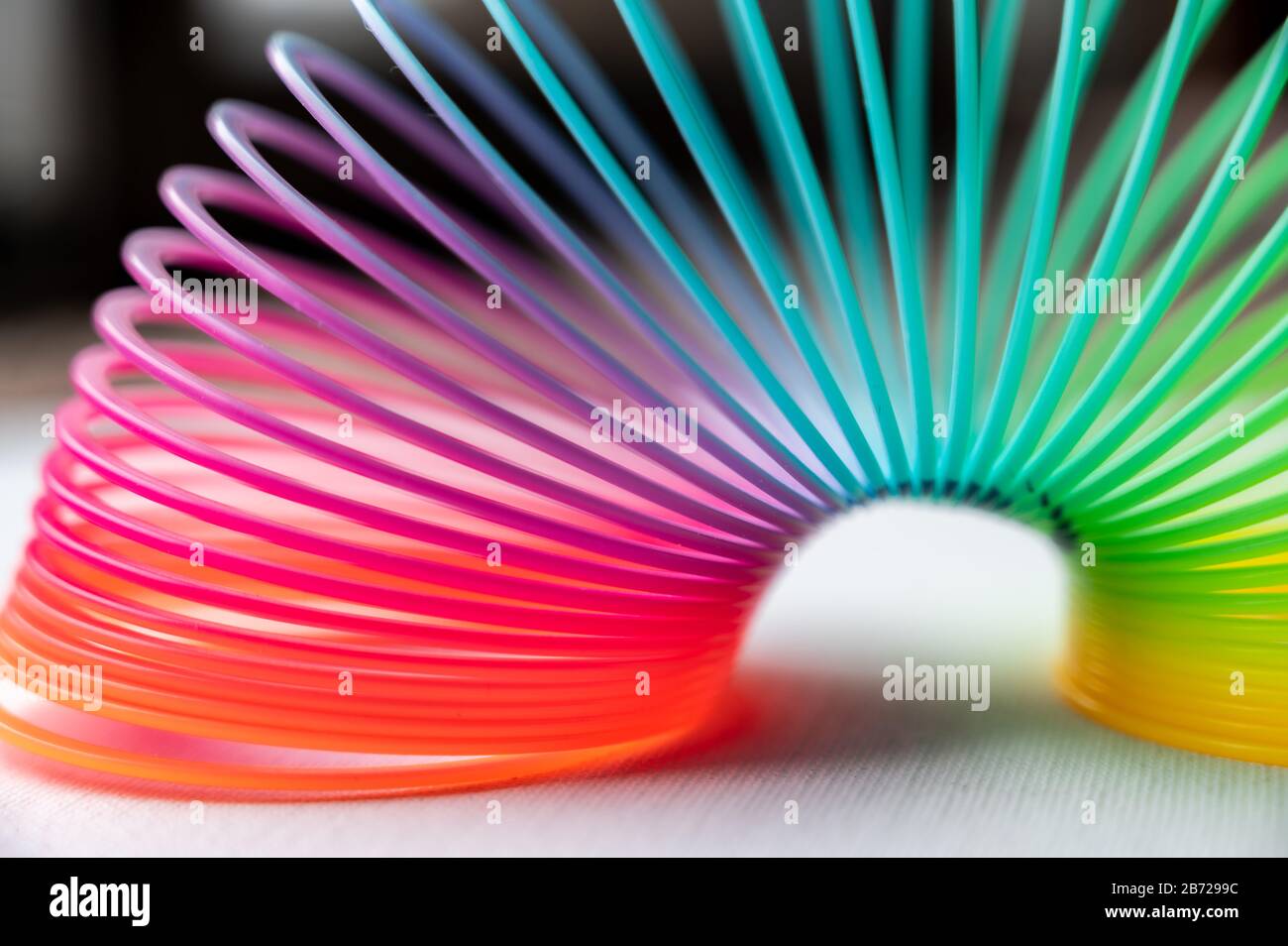 colorful flexible bouncy plastic spring bent into an arch Stock Photo ...