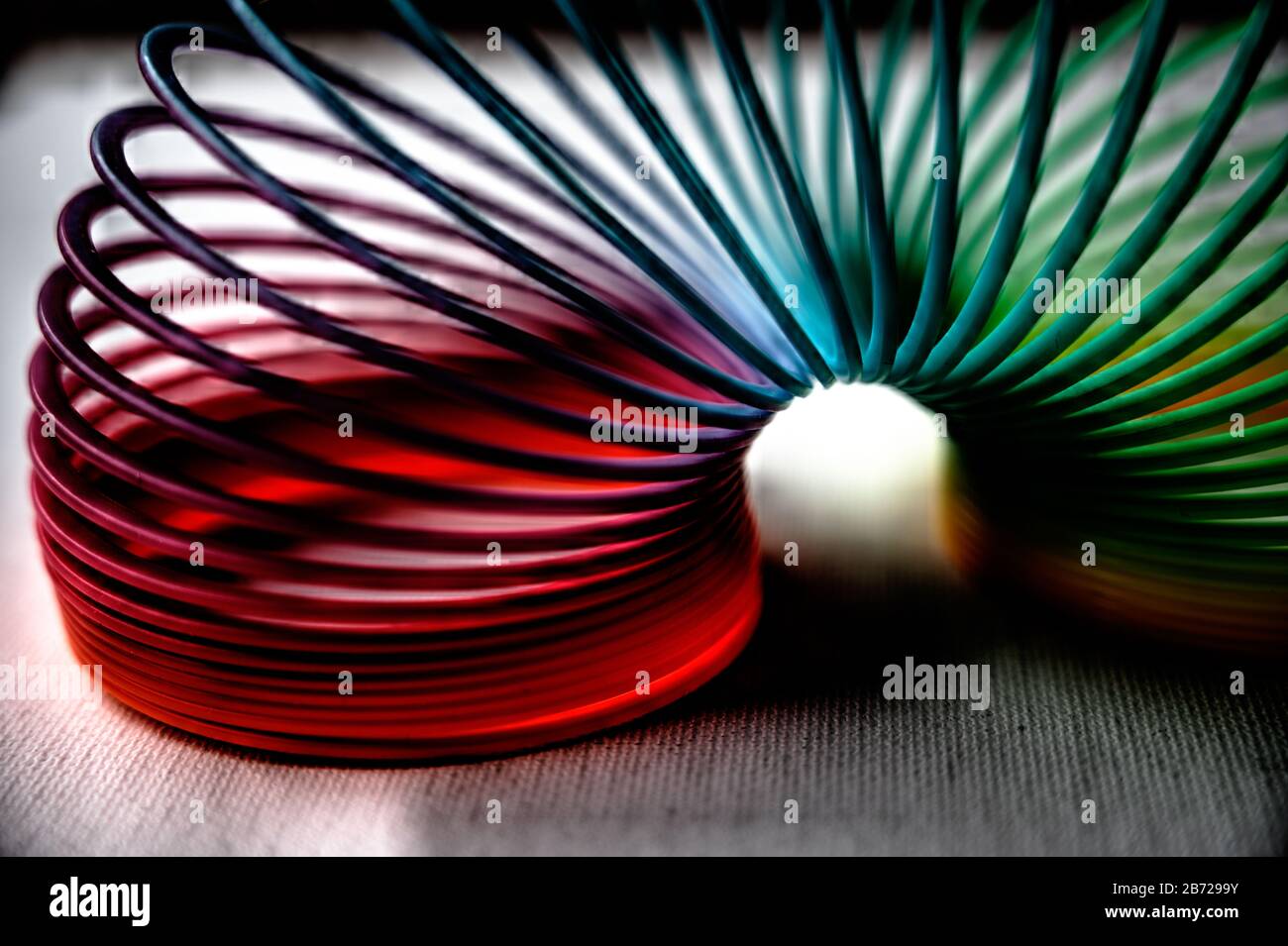 colorful flexible bouncy plastic spring bent into an arch Stock Photo ...