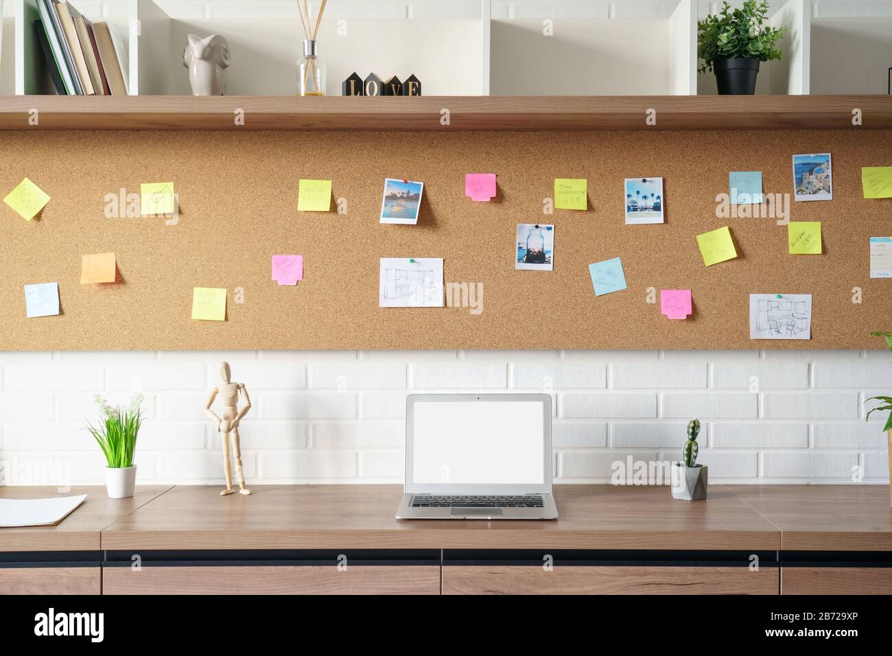 Modern workplace with laptop mock up screen sticky notes at work space ...