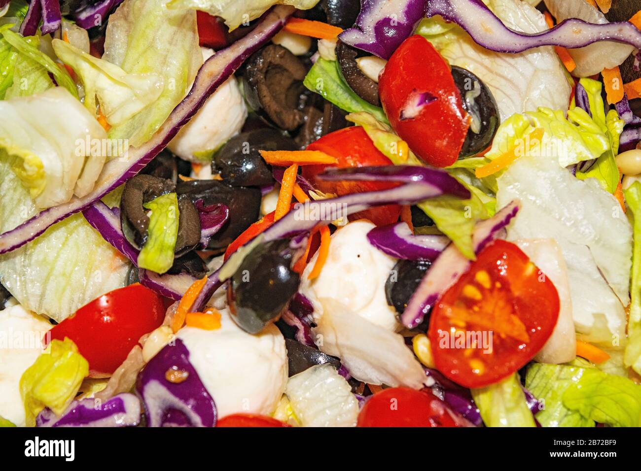 Vegetable salad with mozzarella. Close-up surface texture Stock Photo ...