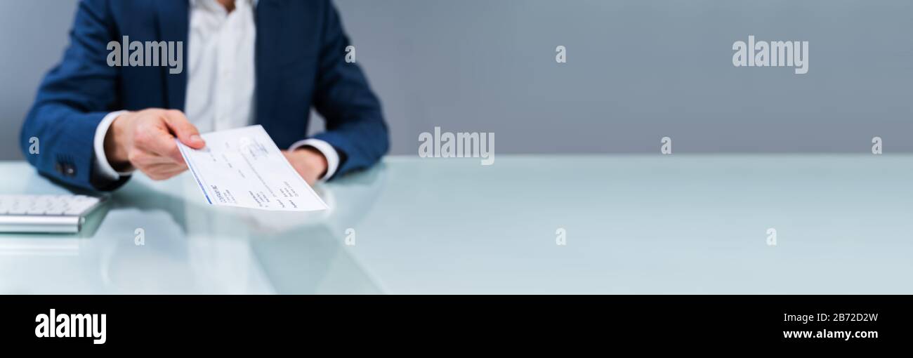 A man holding cheque hi-res stock photography and images - Alamy