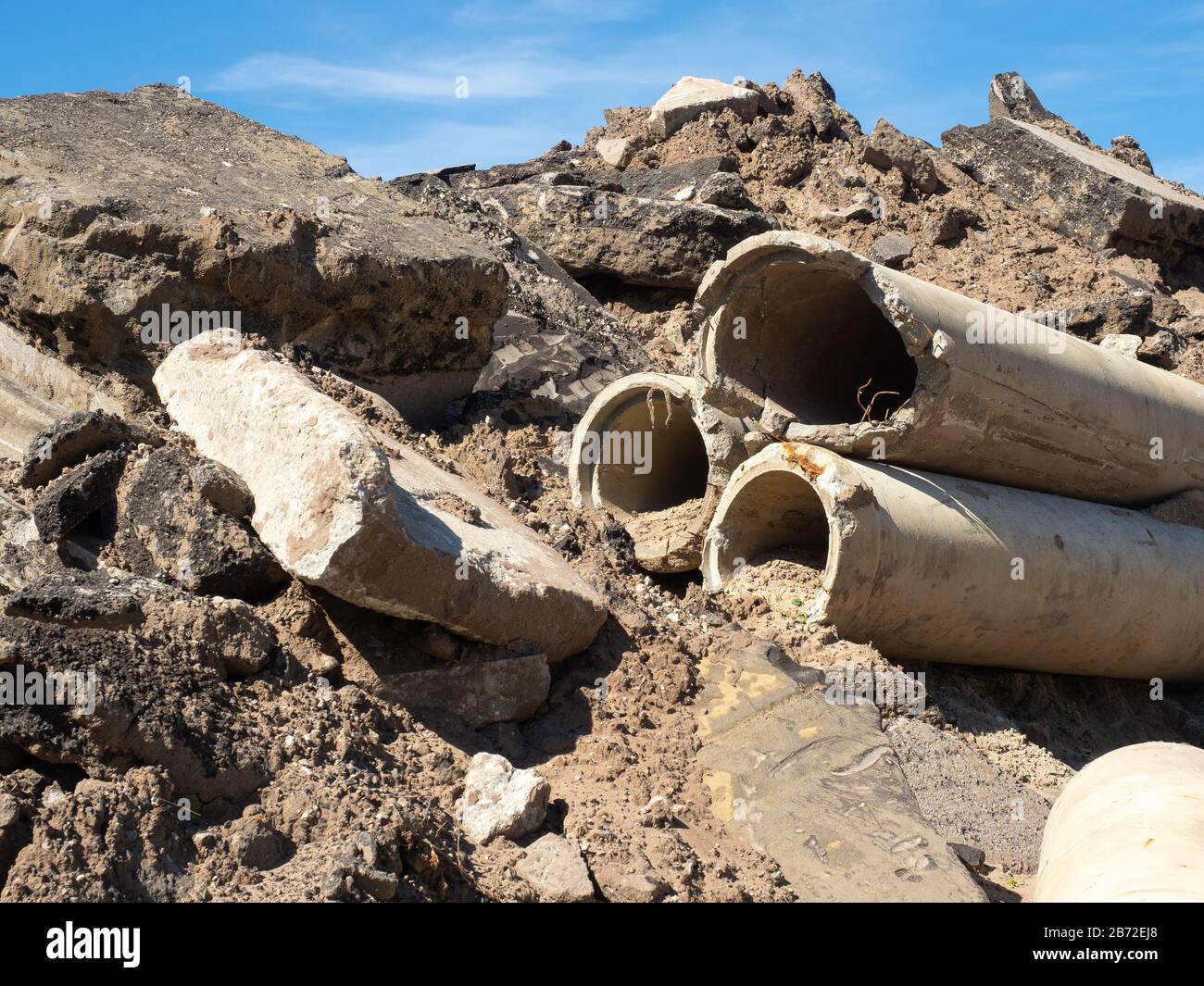 Road Demolition Debris Pile, Road Rubble, Concrete Sewer Pipes ...